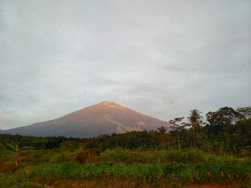 View of Mount Ciremai in West Java, Indonesia with Clouds Stock Image ...