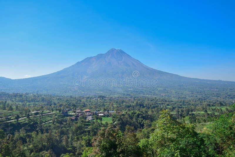 View of Mount Merapi Against a Background of Bright Blue Sky Stock ...