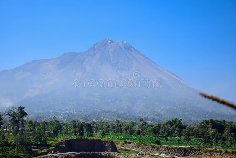 View of Mount Merapi Against a Background of Bright Blue Sky Stock ...