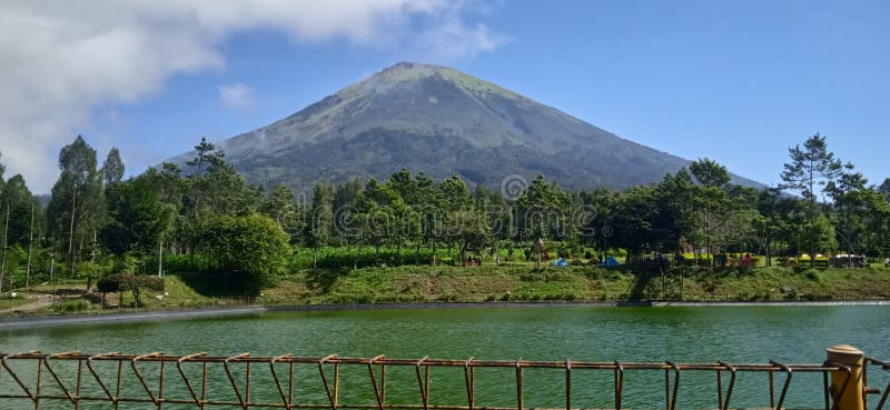 View of Mount Sindoro with a Clear Blue Sky Stock Photo - Image of ...