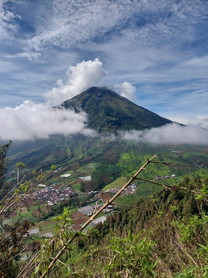View of Mount Sindoro Covered in Clouds Stock Photo - Image of ...