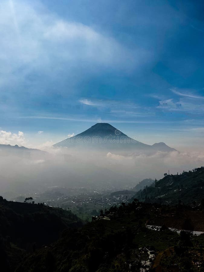 View of Mount Sindoro Indonesia Stock Photo - Image of mountain, plain ...