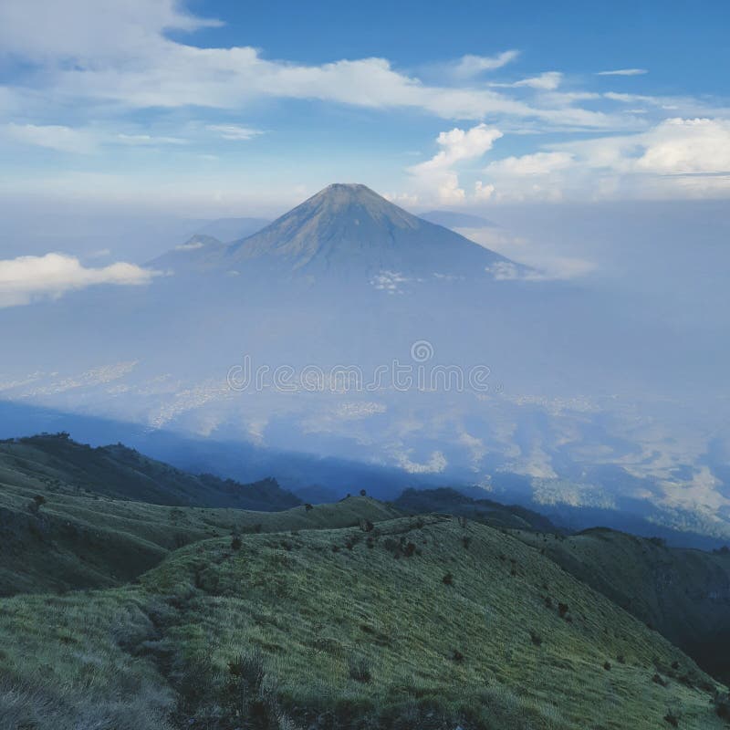 View of Mount Sindoro from Mount Sumbing Stock Image - Image of view ...