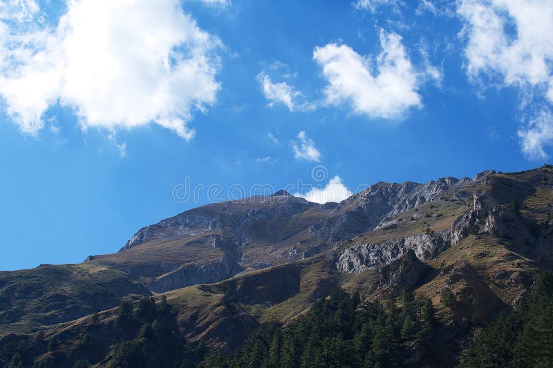 View of the Mountain Pass in the Shade and Blue Sky with White Light ...