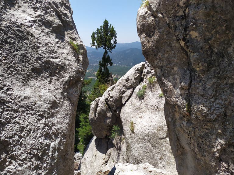 View of the Mountain through between Two Cliffs Stock Image - Image of ...