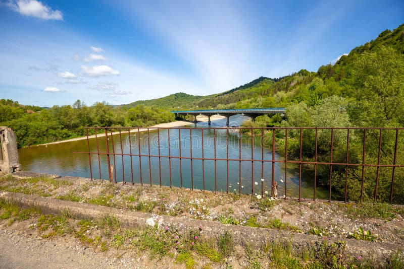 View of a Mountain Valley with River and Bridge in Spring Stock Image ...