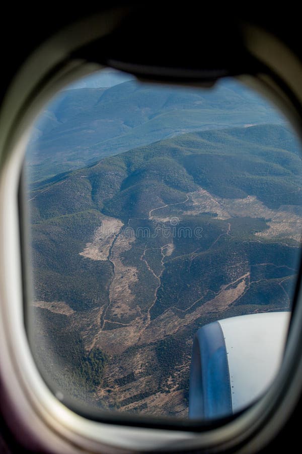 View of the Mountains from the Plane Window. View from a Height. Earth ...