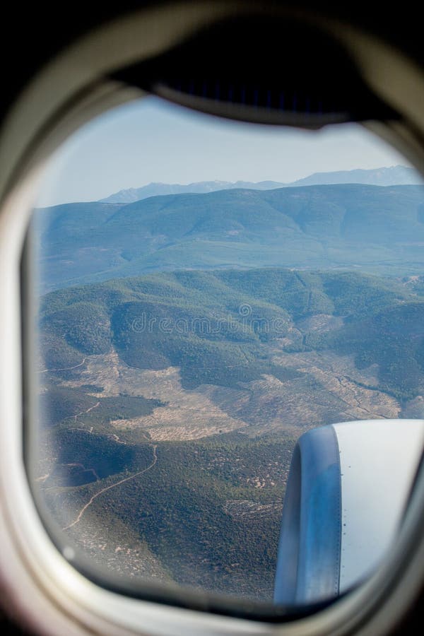 View of the Mountains from the Plane Window. View from a Height. Earth ...