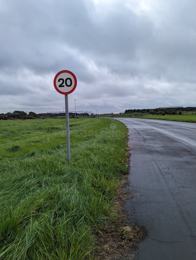 View of 20mph Warning Sign Alongside Low Trafficked Road, Surrounded by ...