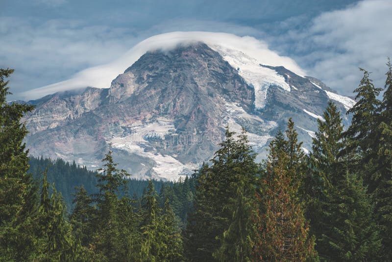 View of Mt Rainier with a Cloud Cap Over the Crest of the Mountain with ...