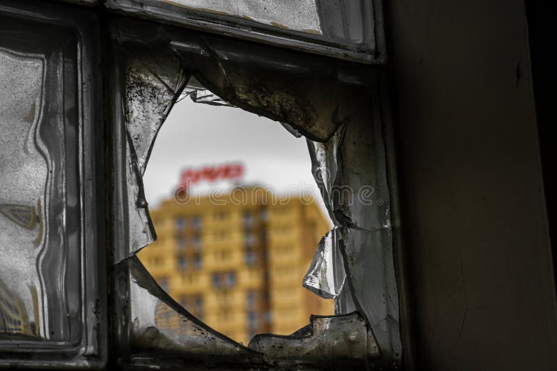 View of a Multi-storey Building through a Broken Window Stock Image ...