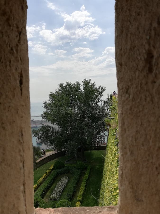 View from the Narrow Window of the Plants and the Garden Stock Photo ...