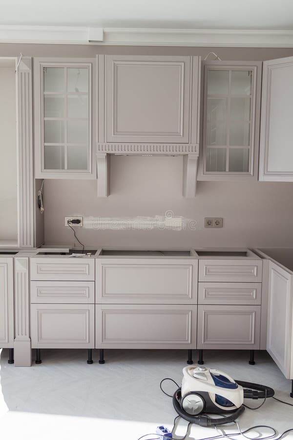 View of the New Elegant Corner Kitchen during Assembly Stock Image ...