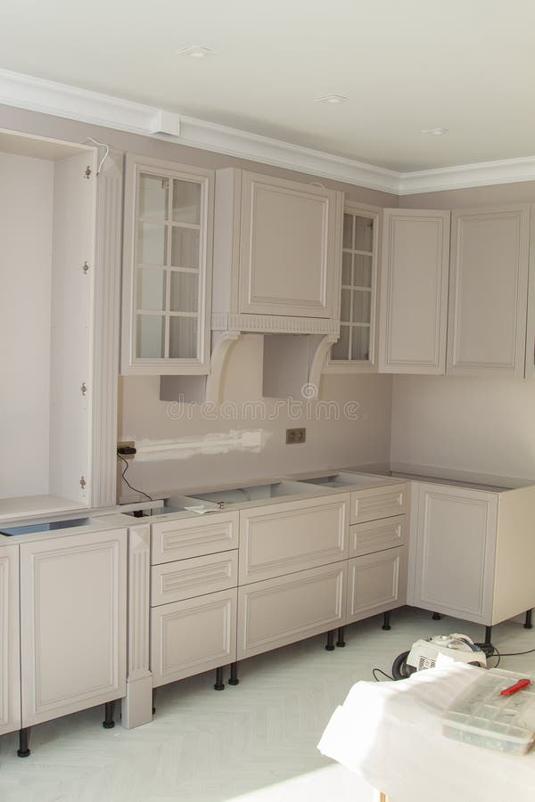 View of the New Elegant Corner Kitchen during Assembly Stock Photo ...