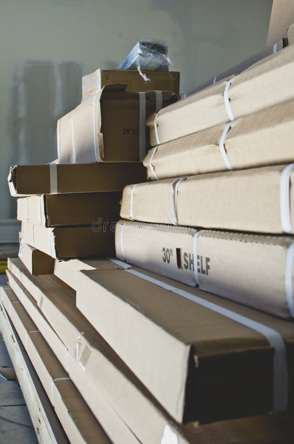 A Stack of Cardboard Boxes in the Shipping Area Stock Image - Image of ...