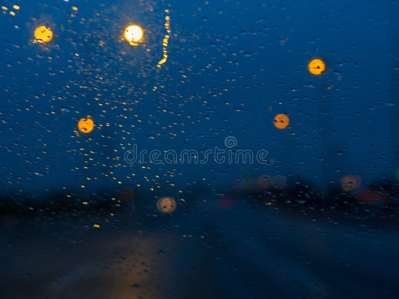 View of Night Highway through the Windshield of a Car at Speed in Rainy ...