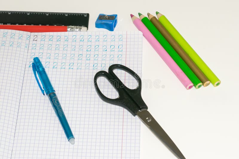 View of a Notebook with Written Numbers Next To it are a Pen a Ruler ...