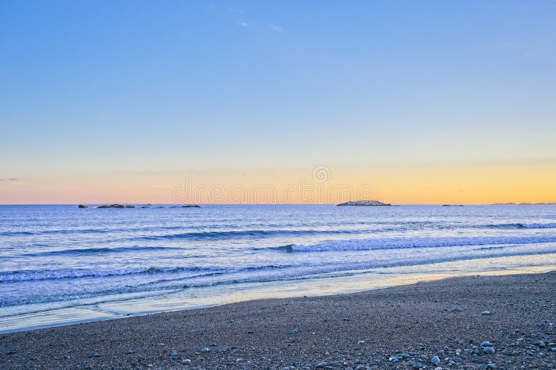 View of the Ocean and Beach Waves during Sunset in the Winter in New ...