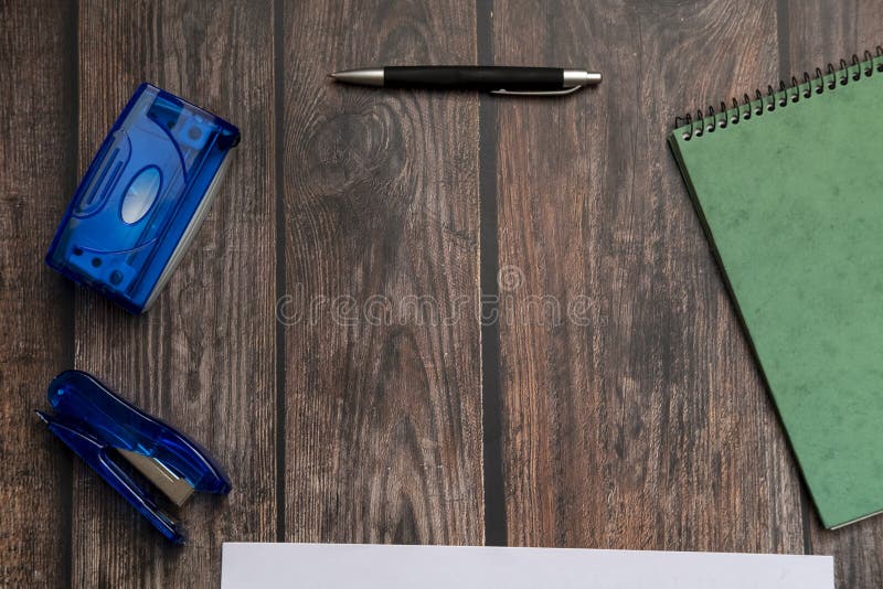 View of an Office Table with a Few of Stationary on Top of it in Flat ...