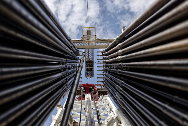 View of an Oil Rig from Below, with a Stack of Drilling Pipes in the ...