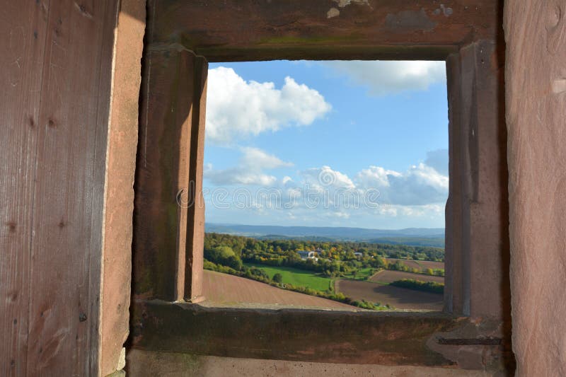 View through an Old Castle Window on a Sky and Green Landscape Stock ...