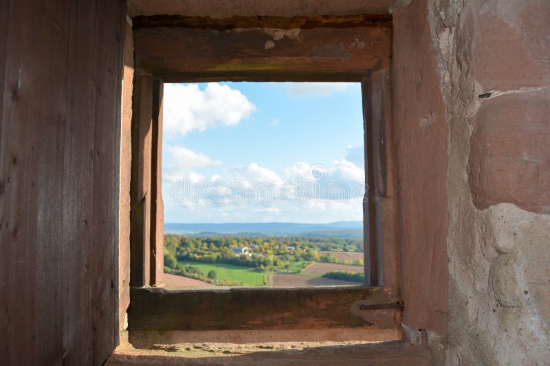 View through an Old Castle Window on a Sky and Green Landscape Stock ...
