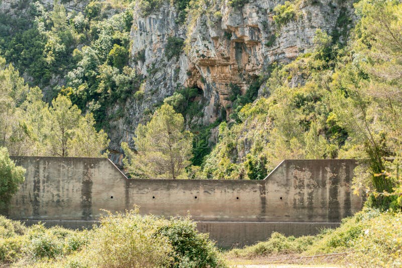 View of an Old Dam Wall in Trees before the Rock Stock Image - Image of ...