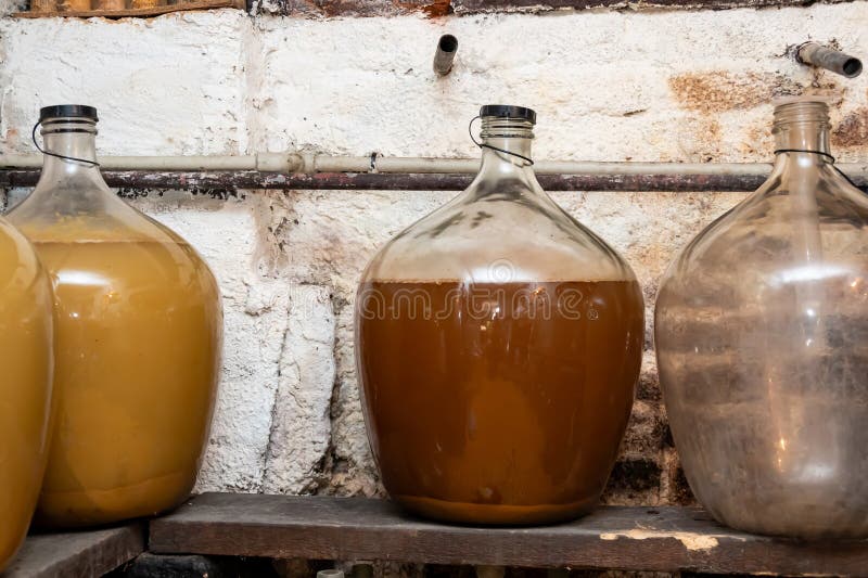 View of Old Fashioned Wine Cellar with Glass Storage for Wine during ...