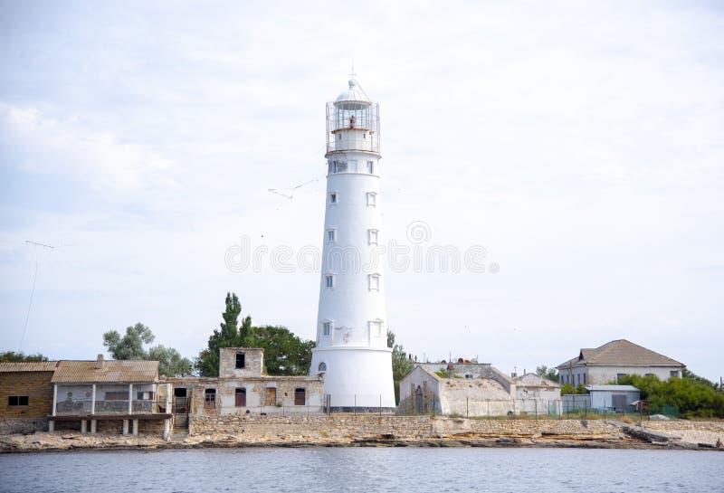 View of the Old Lighthouse from the Sea. Stock Photo - Image of sign ...