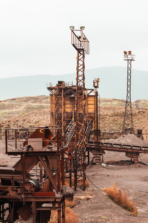 Old and Rusty Abandoned Mine Equipment in the Middle of a Desert. Stock ...