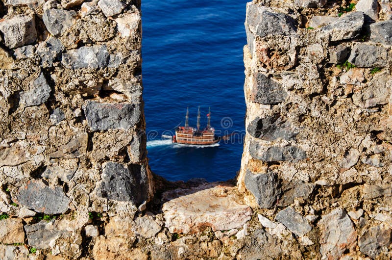 View of the Old Ship through the Opening in Ancient Stone Wall Stock ...
