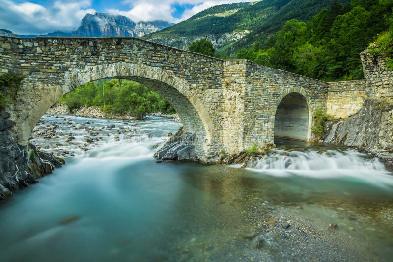 View of Old Stone Bridge Over River Stock Photo - Image of ancient ...