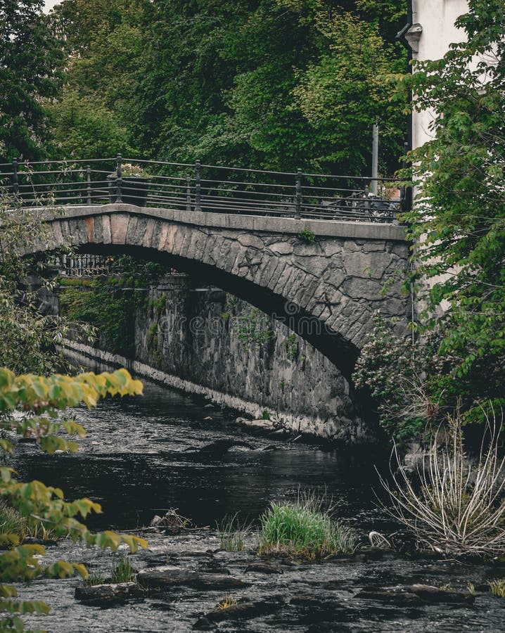 View of Old Stone Bridge Over a Stream Stock Image - Image of waterway ...