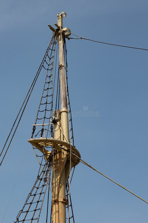View of an Old Tall Ship Mast with Rigging and Shrouds Against a Deep ...