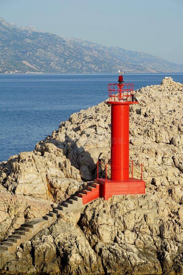 View of the Open Sea Above the Islet with the Small Red Lighthouse ...