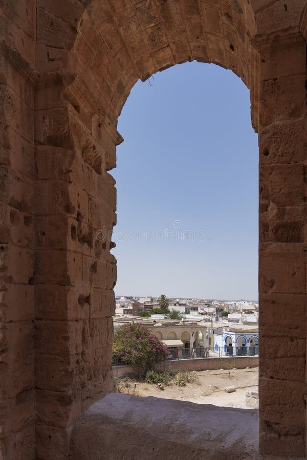 View through the Open Stone Windows Onto the Buildings Stock Photo ...