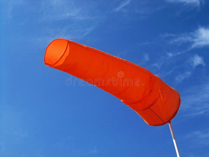 ORANGE WINDSOCK in the WIND Stock Image - Image of colours, billowing ...