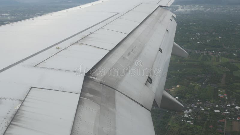 View Out of the Plane Window with Wing View while Approaching Prepared ...