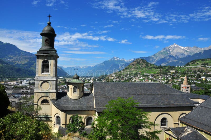 Sion Old Town Vertical View With Scenic Pedestrian Laneway With Paved ...