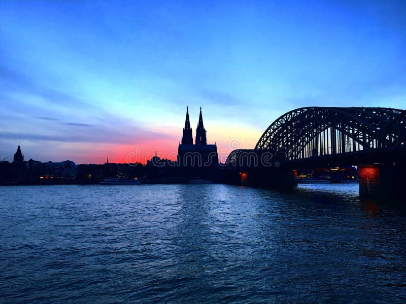 Sunset in Cologne stock image. Image of dark, night - 115260827