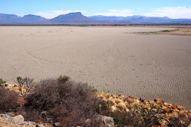 View Over Parched and Empty Dam, with Cracked Mud Stock Image - Image ...