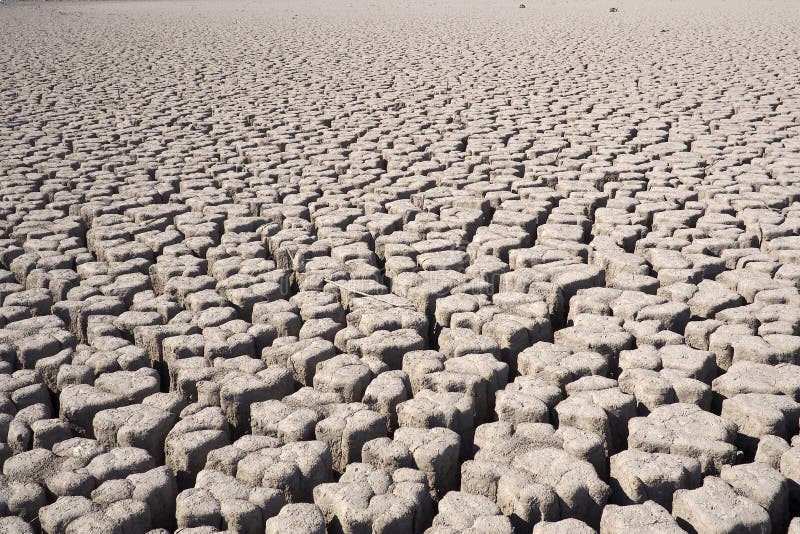 View Over Parched and Empty Dam, with Cracked Mud Stock Photo - Image ...