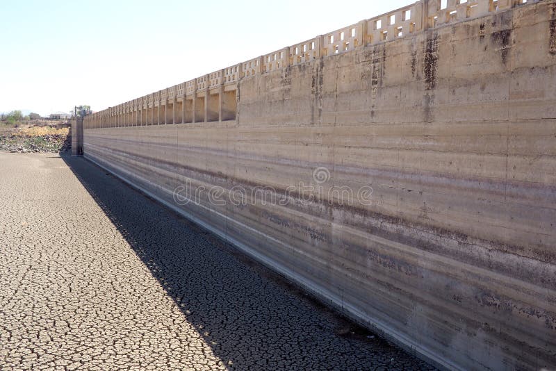 View Over Parched and Empty Dam, with Cracked Mud Stock Photo - Image ...