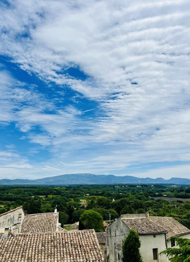 View Over Provençal Rooftops: Rolling Plains and Distant Mountains ...