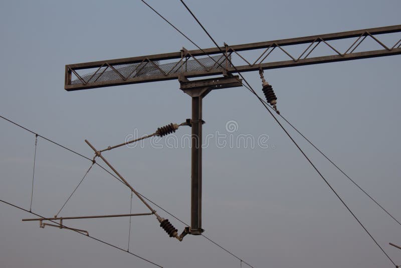 View of Overhead Electric Lines Used by Train Locomotives. Pole ...