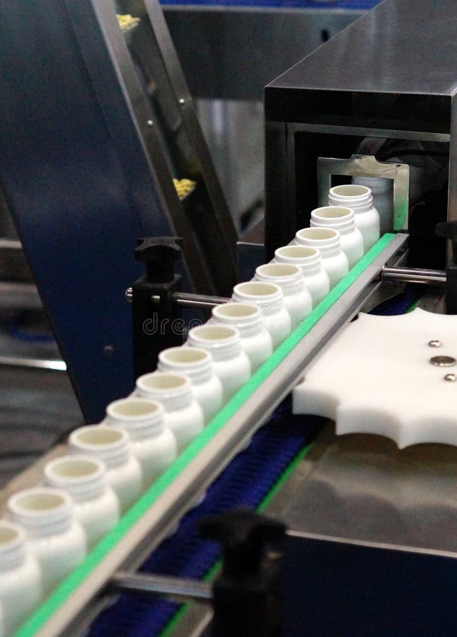 View of Packaging in Plastic Bottles or Containers Machine Stock Image ...