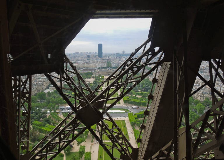 Eiffel Tower View Paris through Iron Grid Stock Photo - Image of arch ...