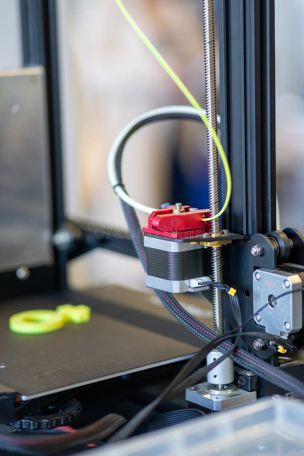 View of a Part of a 3D Printer Printing a Green Symbol from Plastic Stock Photo - Image of ...