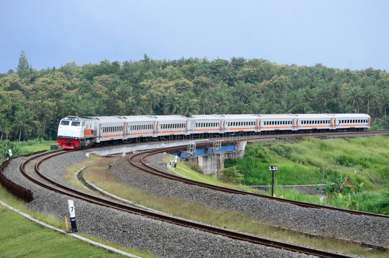 View of a Passenger Train Moving in a Rural or Hilly Area Stock Image ...