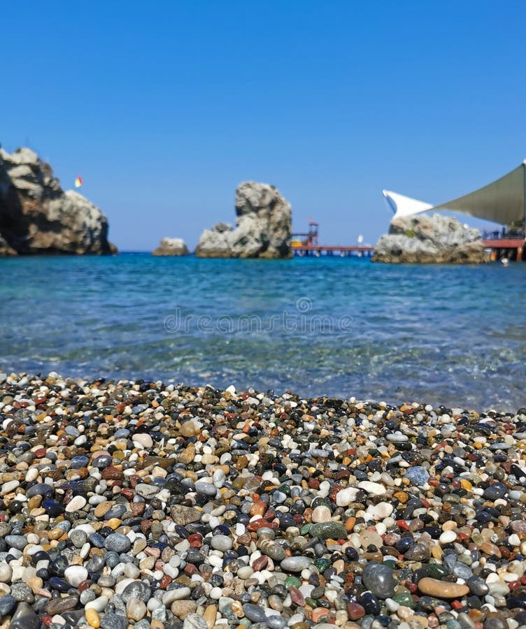View of the Pebble Beach and the Sea with Rocks. the Aegean Sea. Turkey ...